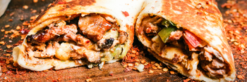 Shawarma: What It Is, How It’s Made, Ingredients, and Serving Styles ...